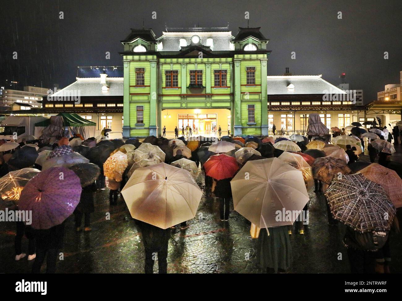 People enjoy an event to celebrate the opening of the rebuilt Mojiko ...