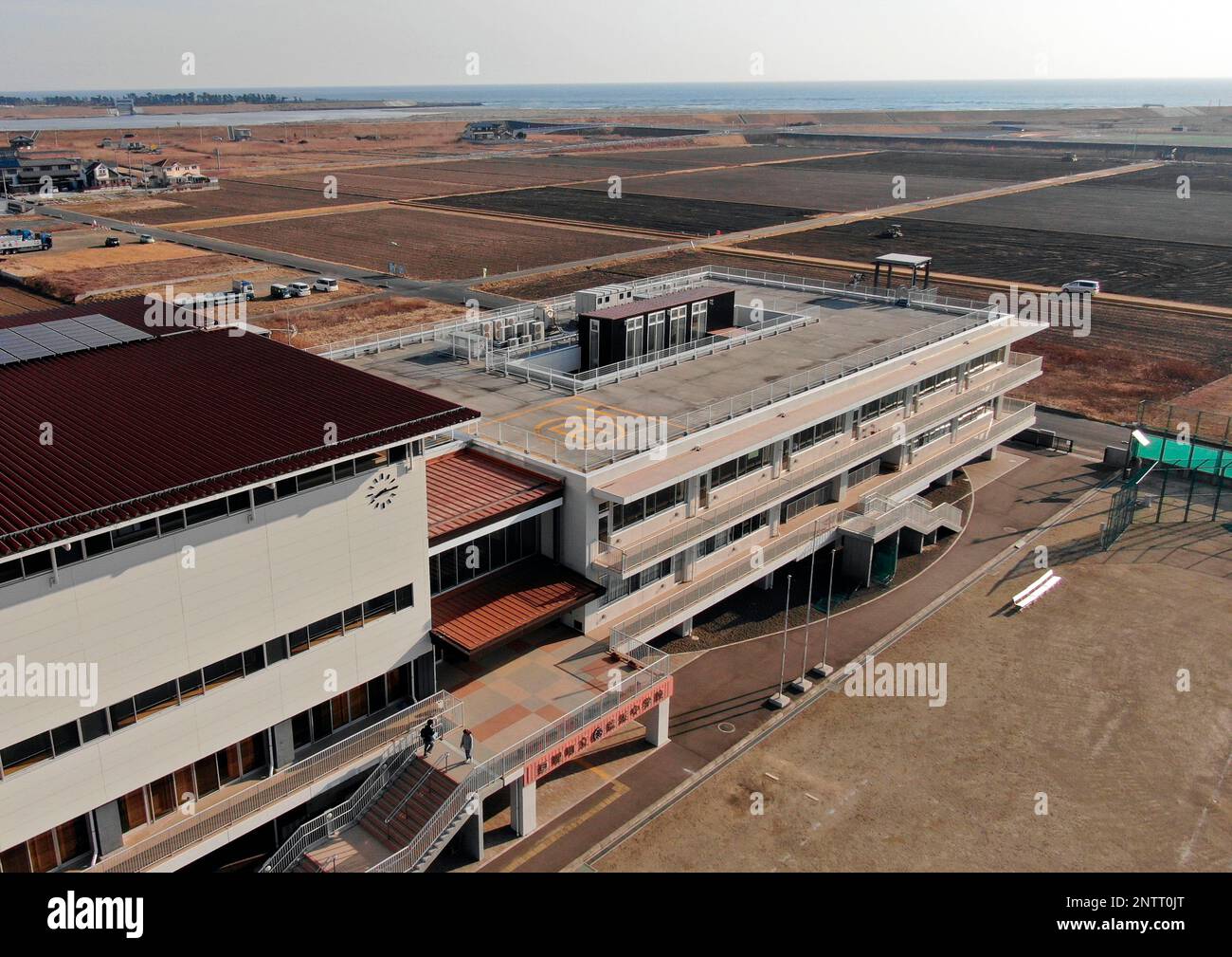 A rebuilt Arahama Junior High School is pictured at 1-kilometer form ...