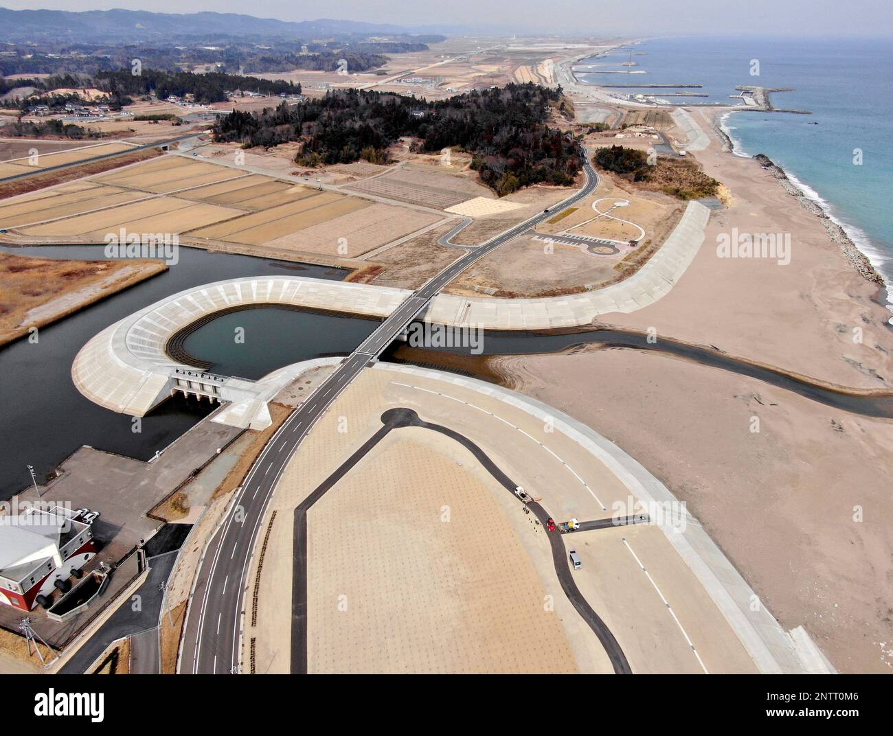 A picture shows tide embankment in Rachikizaki area, Shinchi Town ...