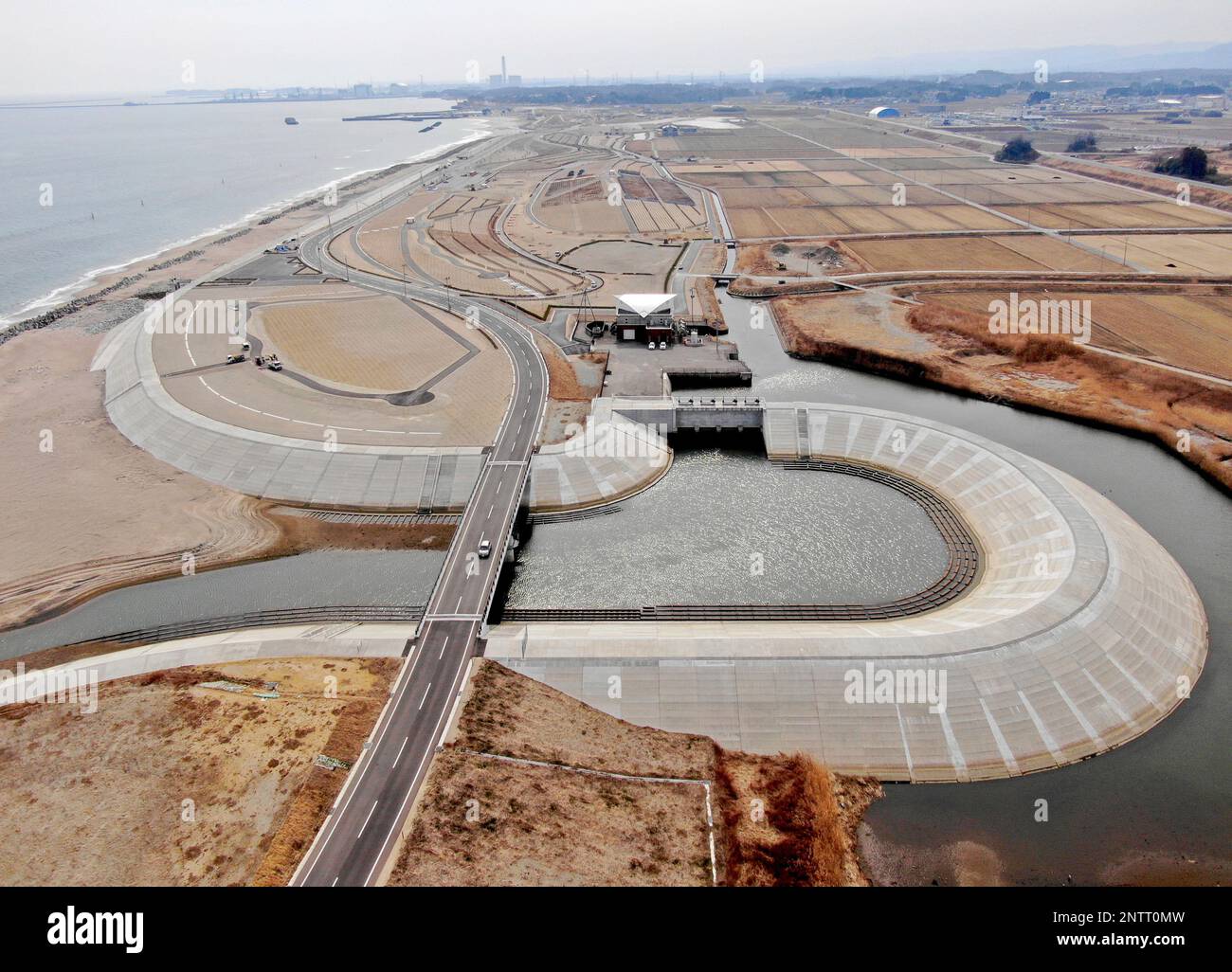 A picture shows tide embankment in Rachikizaki area, Shinchi Town ...