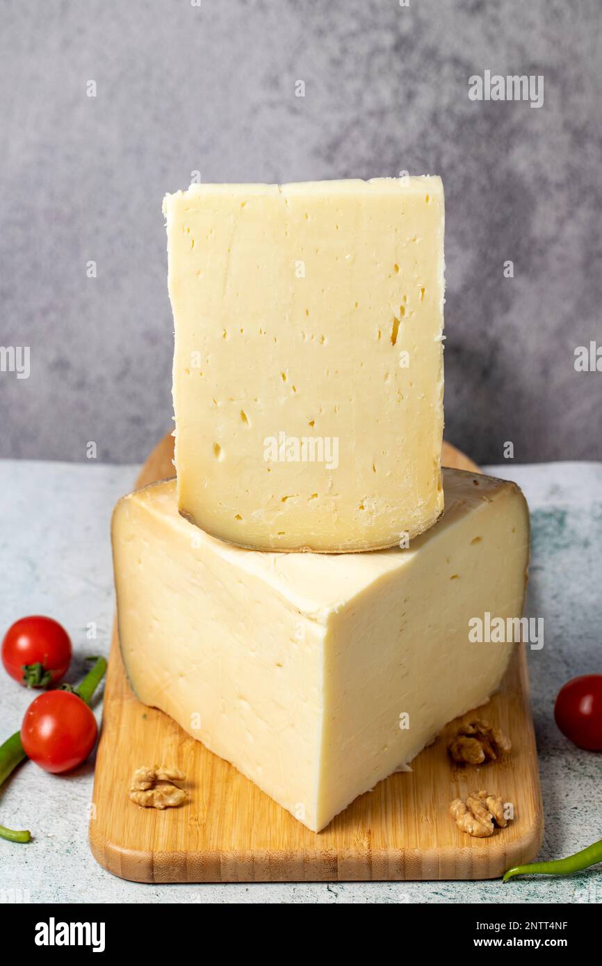 wheel cheese. Cheese made from cow's milk on a wooden flipchart ...