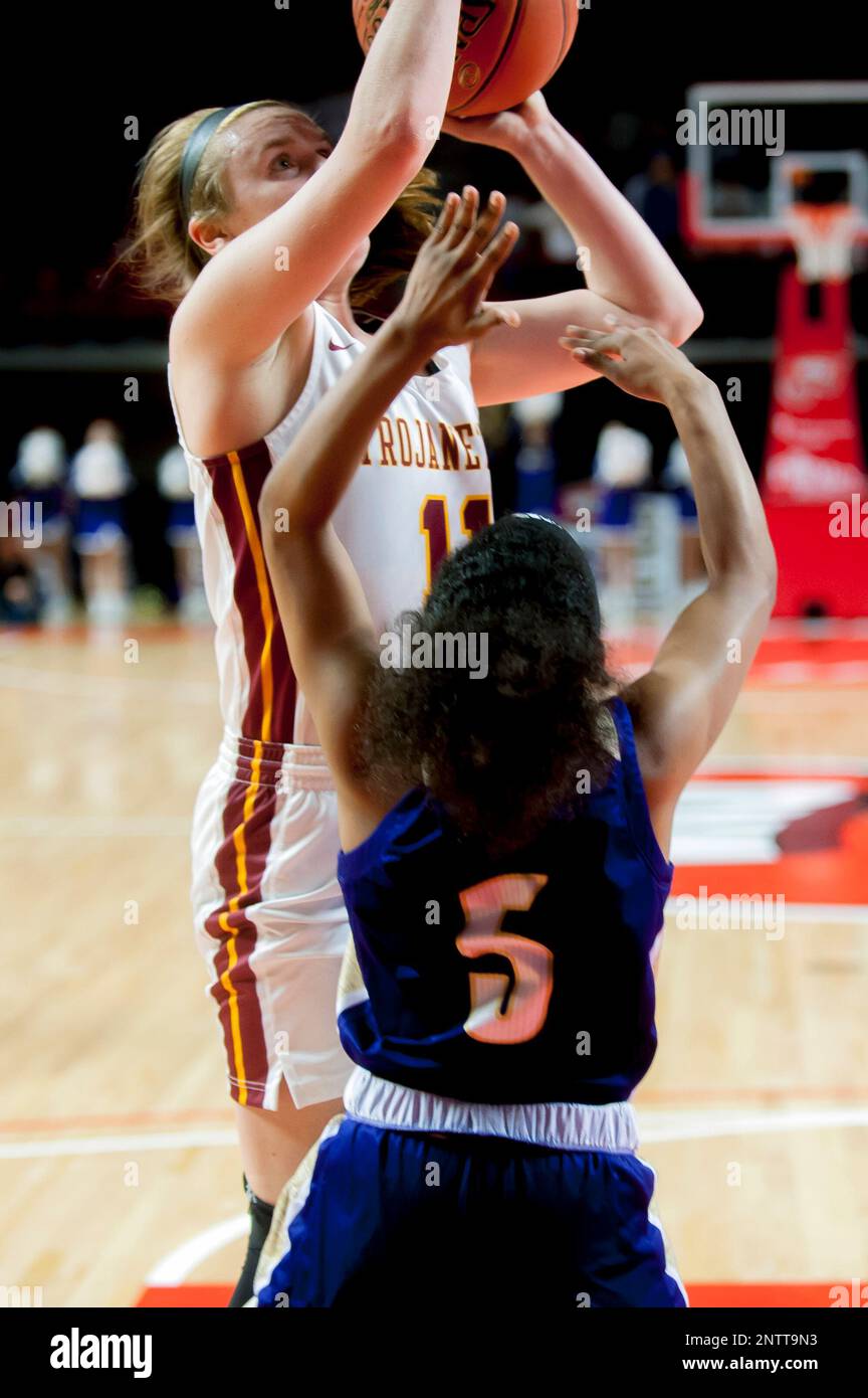 Barren County's Elizabeth Bertram (left) shoots against Bowling Green's ...