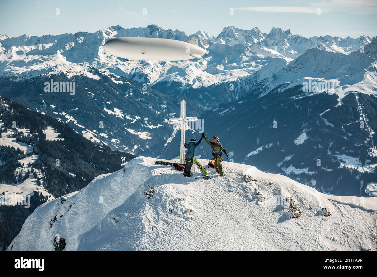 Three skiers rappelled out of a Zeppelin onto an Austrian mountain top ...