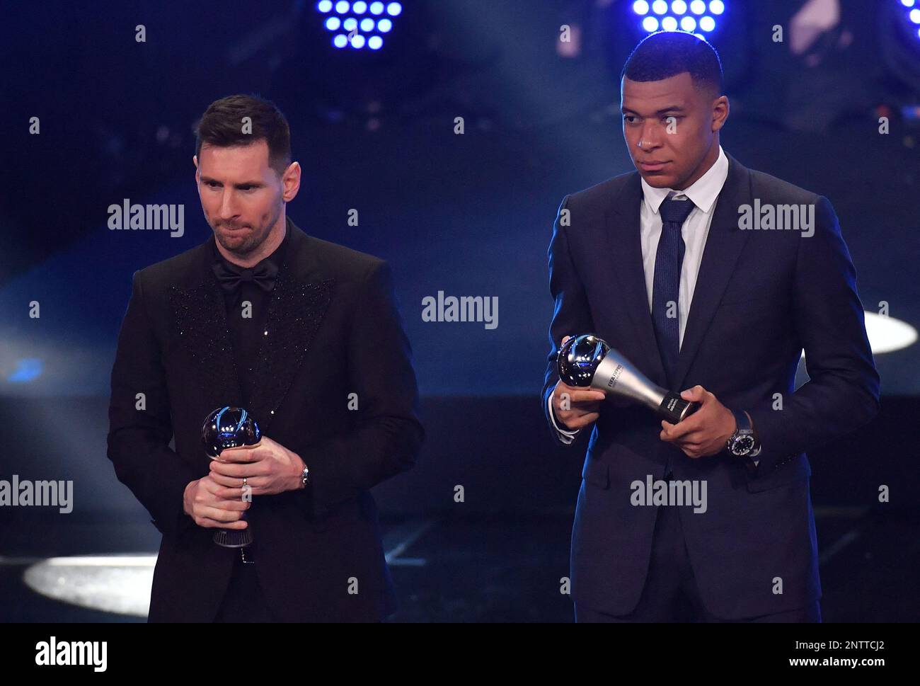 Paris, France. February 27, 2023, Lionel Messi and Kylian Mbappe are seen with their trophies ...