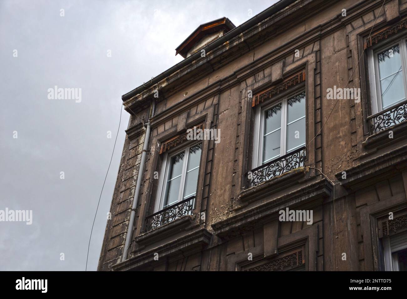 Saint-Etienne, France - January 27th 2020 : Focus on an old facade ...