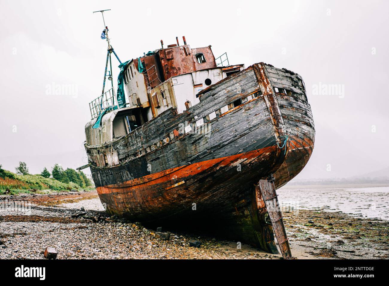 Corpach Shipwreck with Ben Nevis . Rusting remains of the MV Dayspring ...