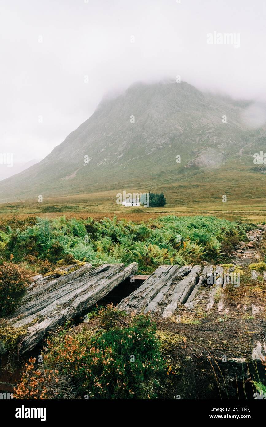 Bridge with river and mountains in the background. In Glencoe in the ...