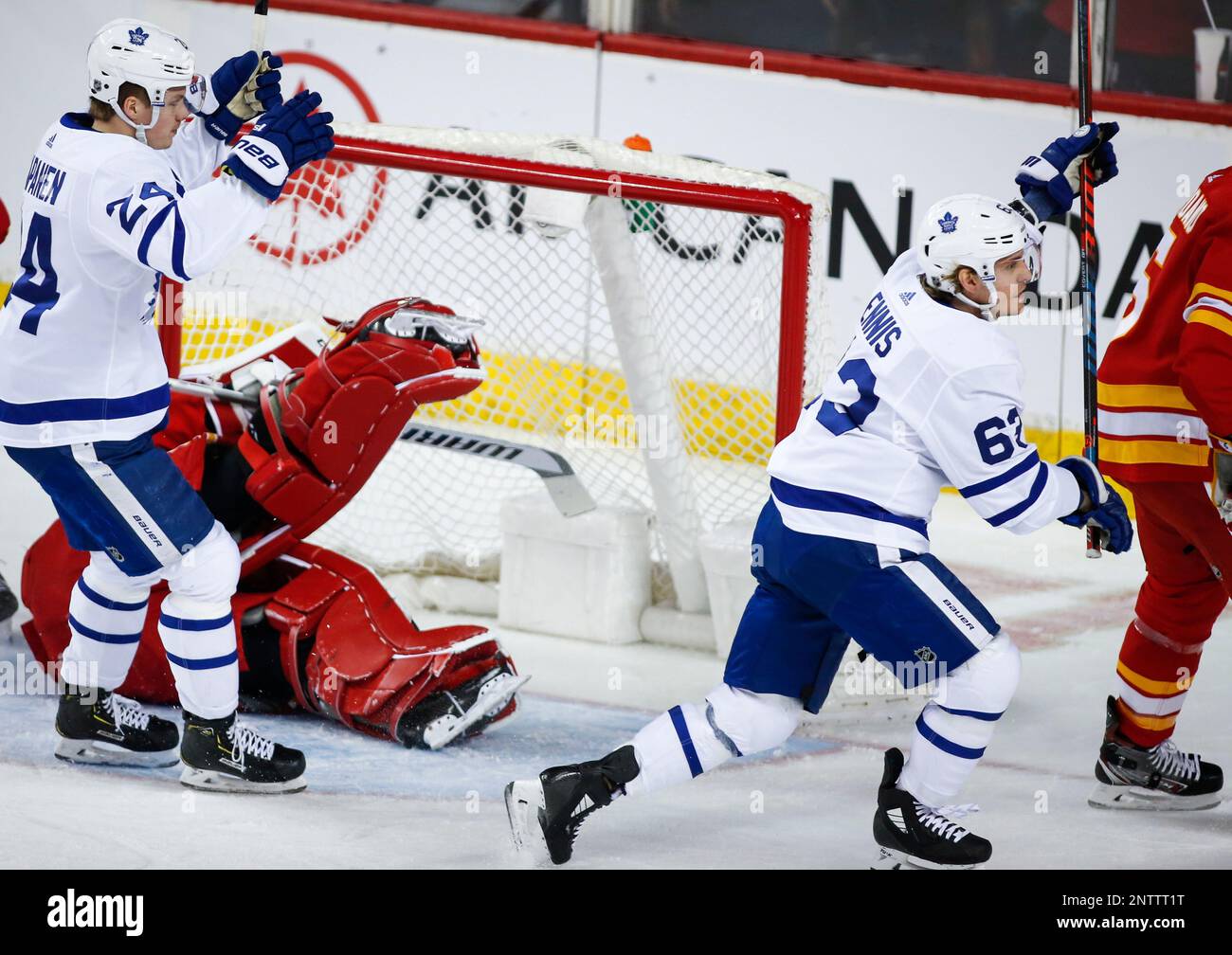 Toronto Maple Leafs' Tyler Ennis, right, celebrates his goal on Calgary ...