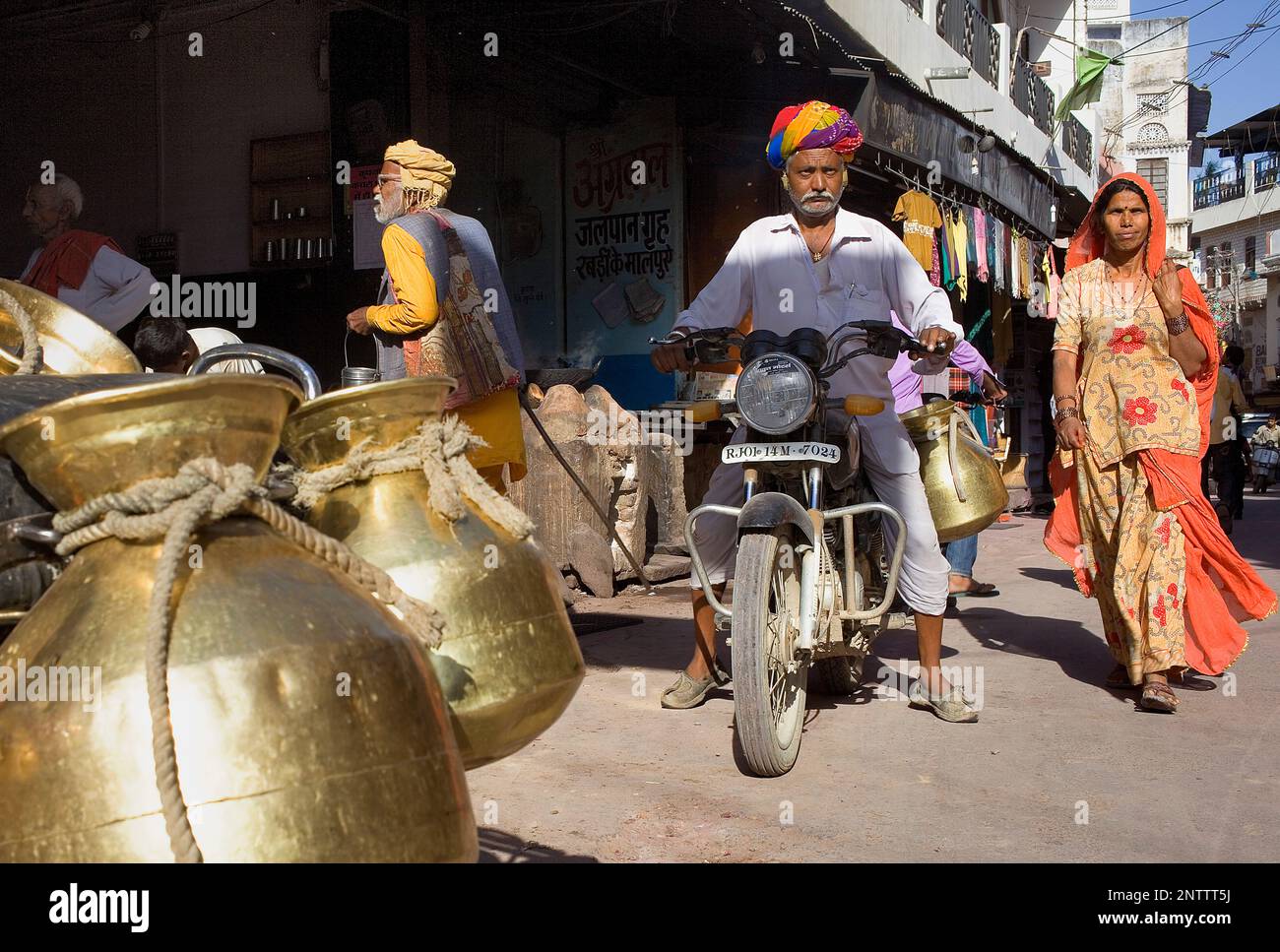 Street scene,milkman,pushkar, rajasthan, india Stock Photo - Alamy