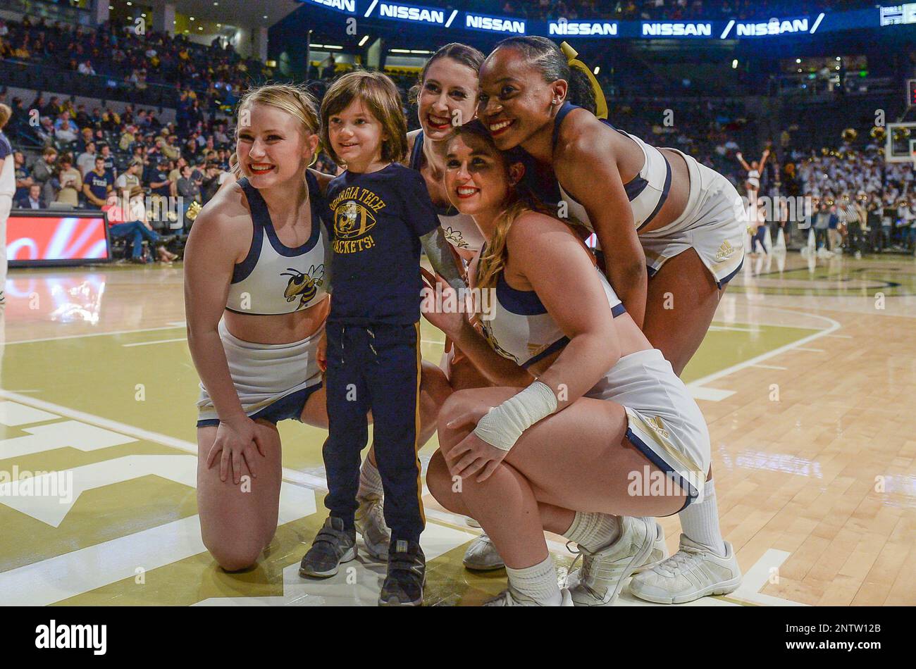 ATLANTA, GA – MARCH 03: The Georgia Tech cheerleaders gather around a ...