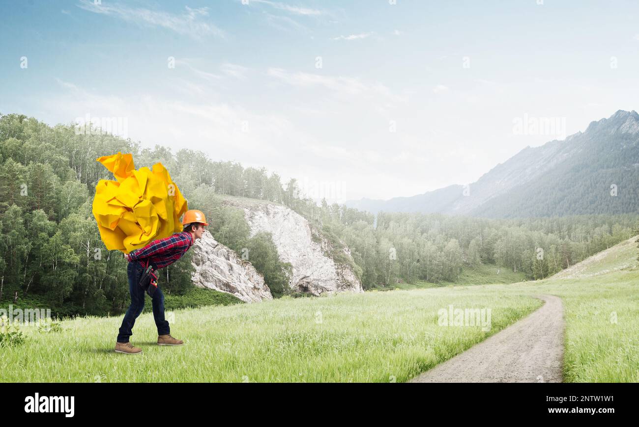 Engineer man carry load Stock Photo - Alamy