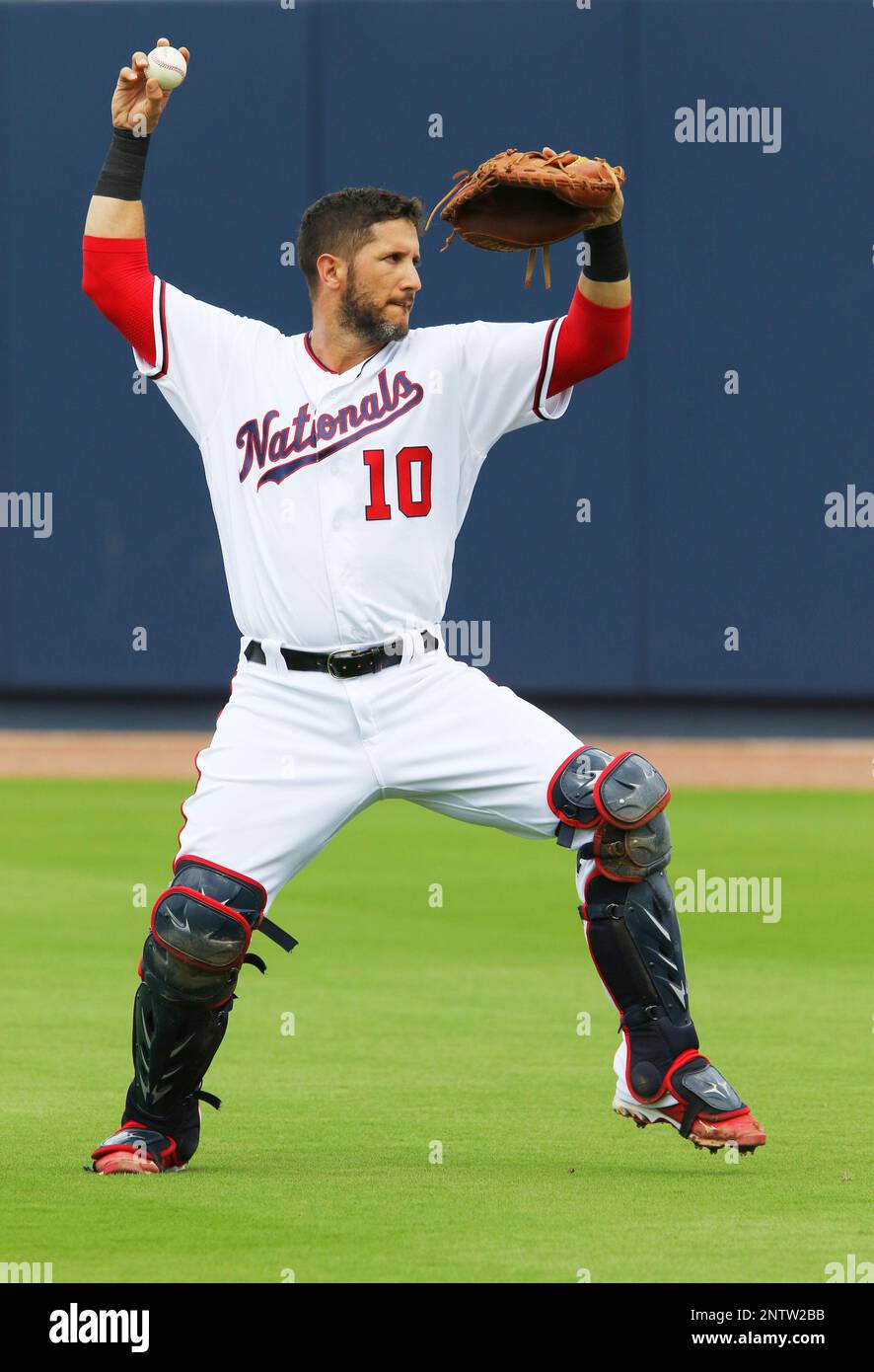Washington Nationals catcher Yan Gomes warms up before a spring ...