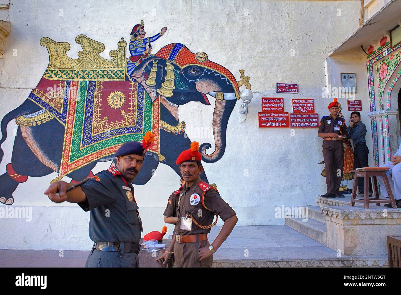 Guards,City Palace,paintings on the wall at the entrance of the palace ...