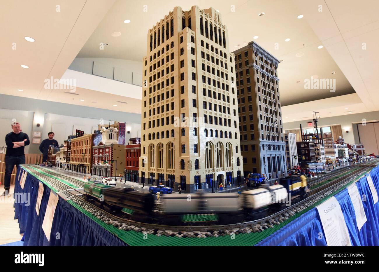 A train cruises past a Lego city display created by Jason Spear and the ...