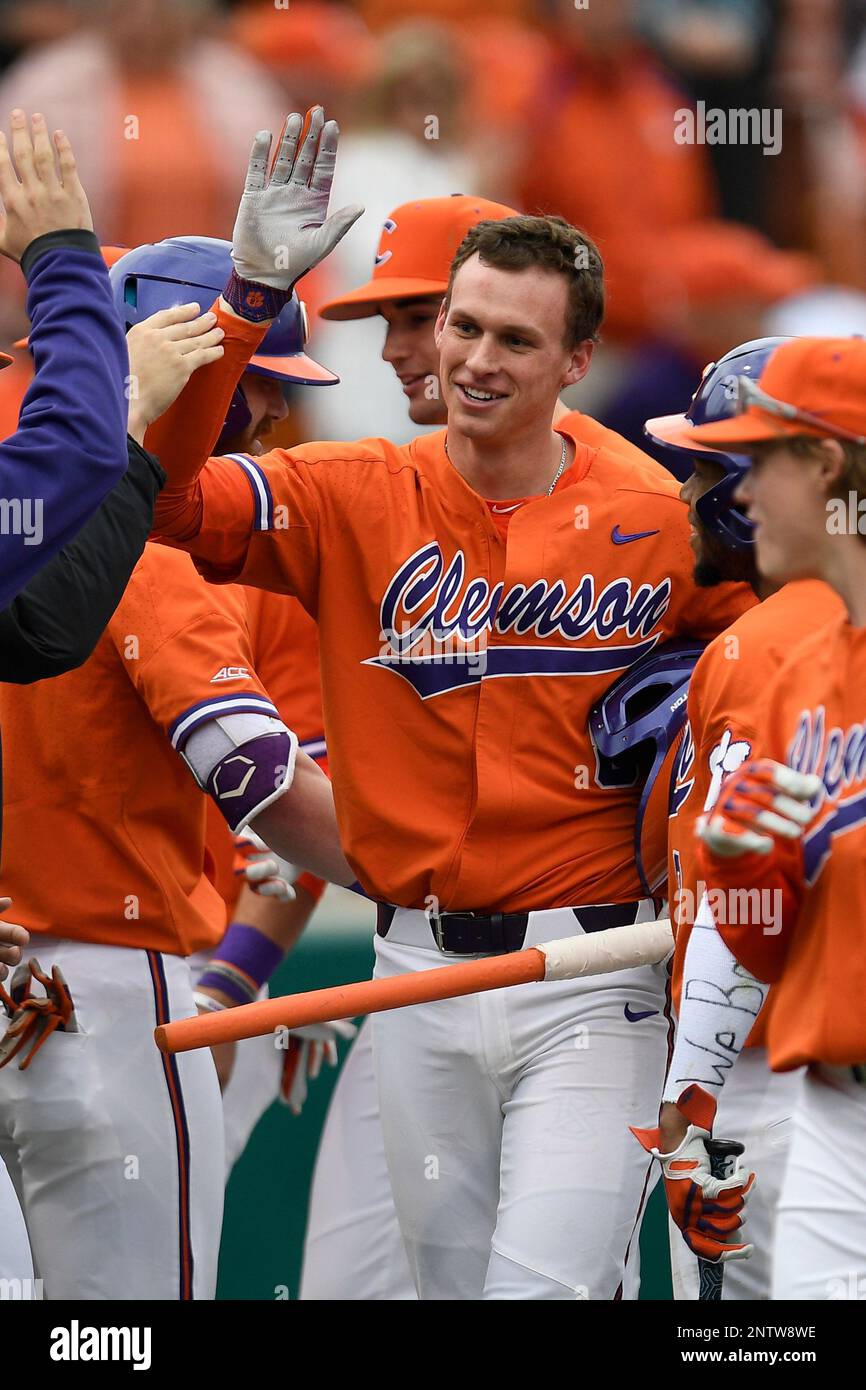 Shortstop Logan Davidson (8) of the Clemson Tigers crosses the plate ...