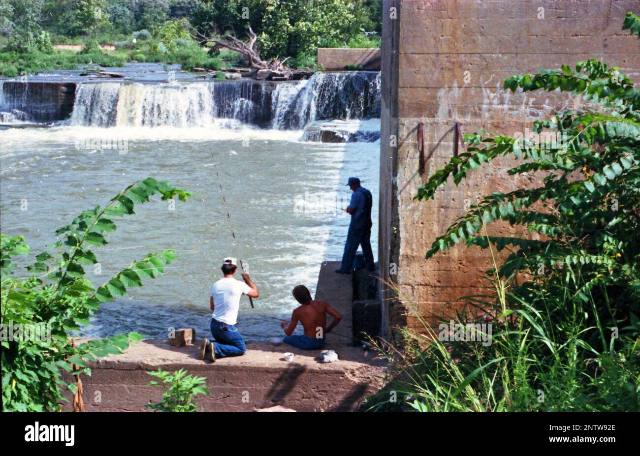 Men fish at Lake Frances in Aug. 1989.(Jake Fink/Tulsa World via AP ...