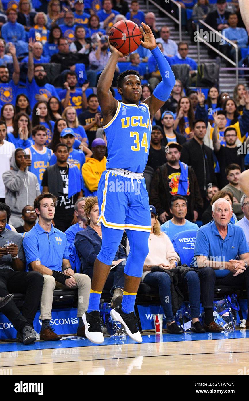LOS ANGELES, CA - FEBRUARY 28: UCLA guard David Singleton (34) hits a three pointer in overtime ...
