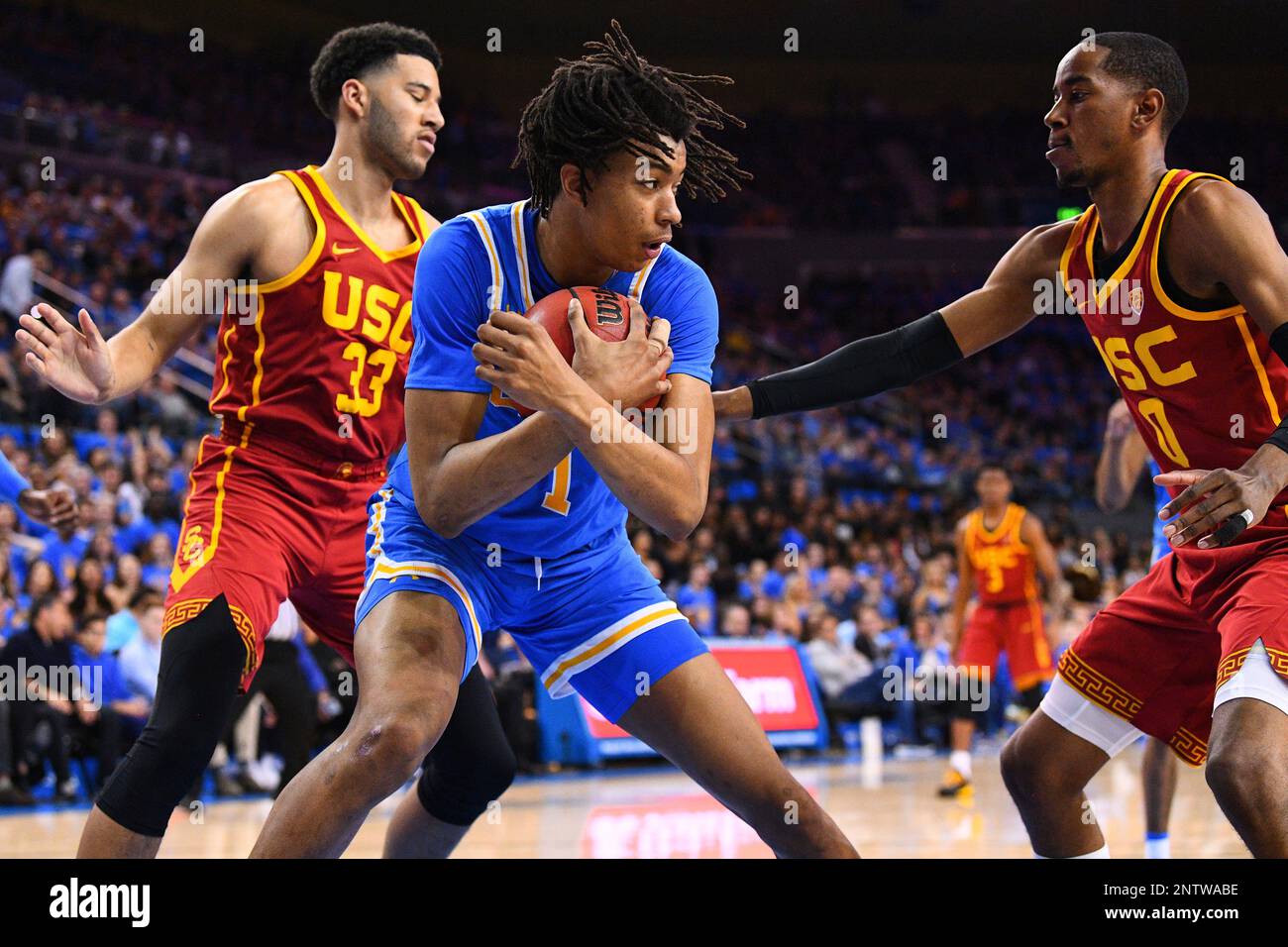 LOS ANGELES, CA - FEBRUARY 28: UCLA center Moses Brown (1) grabs a ...
