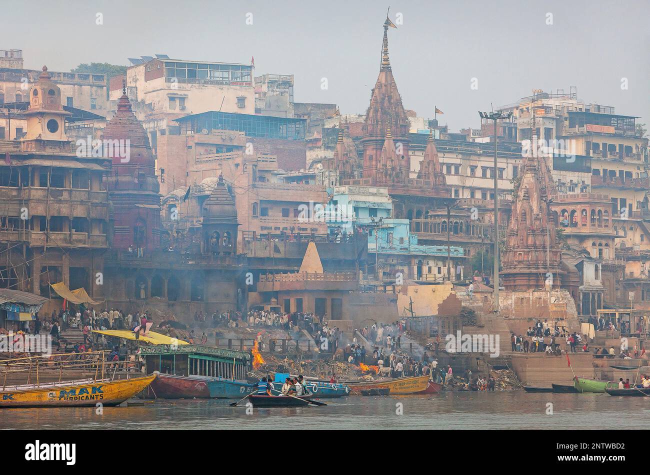 Manikarnika Ghat, the burning ghat, on the banks of Ganges river ...