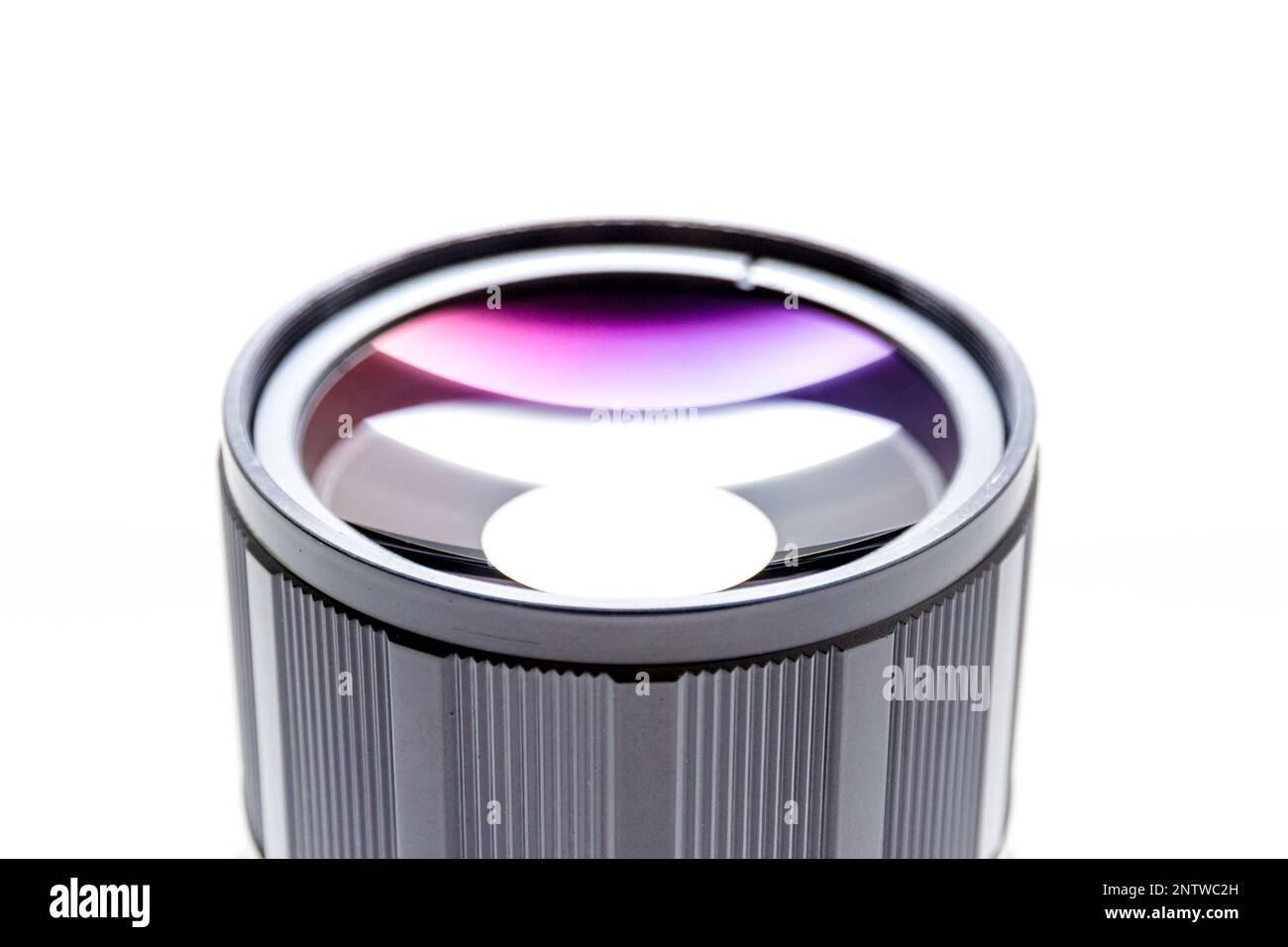 Front view of a soviet era mirror tele lens with color reflections ...