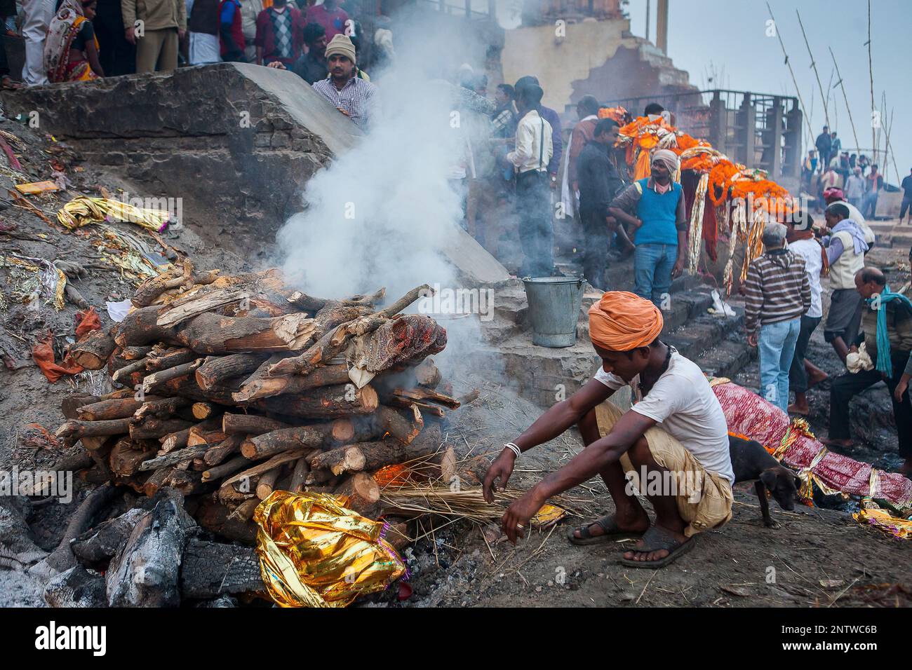 Cremation of a body, in Manikarnika Ghat, the burning ghat, on the ...