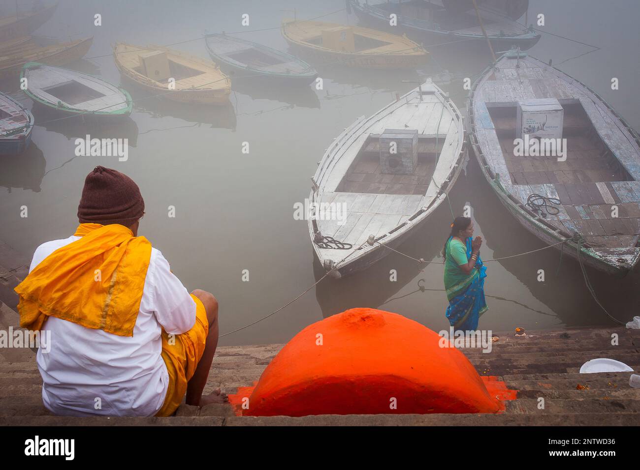 Pilgrims praying, in the ghats of Ganges river, Varanasi, Uttar Pradesh ...