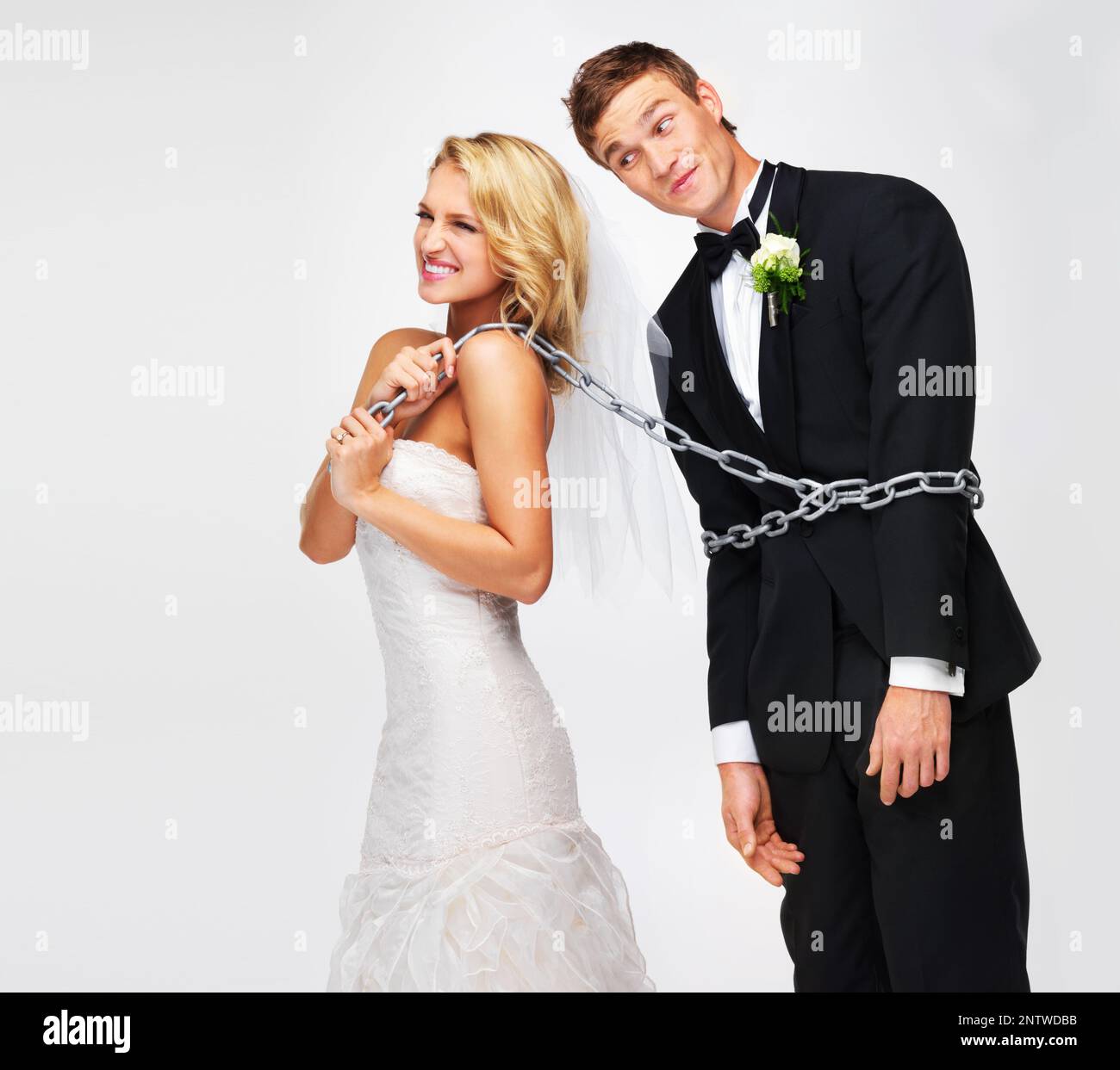 Ive got my man now. Smiling young bride pulling her groom along by a ...