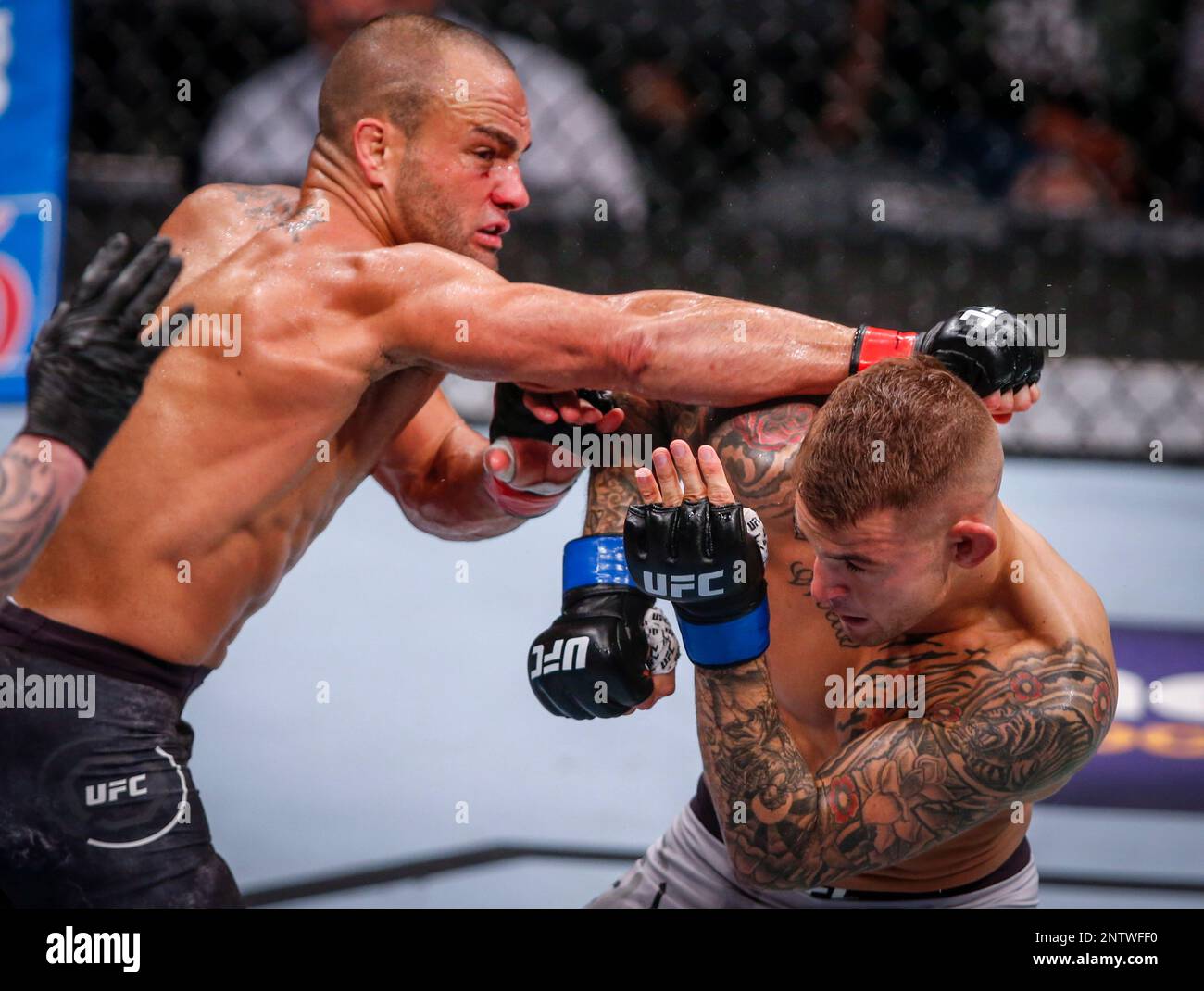 File-This July 28, 2018, file photo shows Eddie Alvarez, left, hitting ...