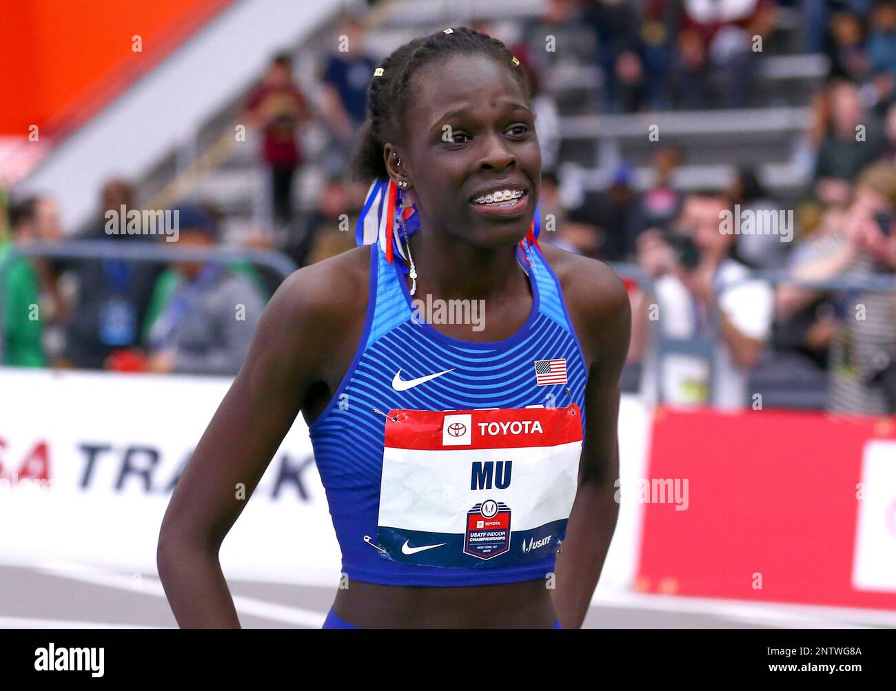 Athing Mu celebrates after setting a new American Record time of 1:23 ...