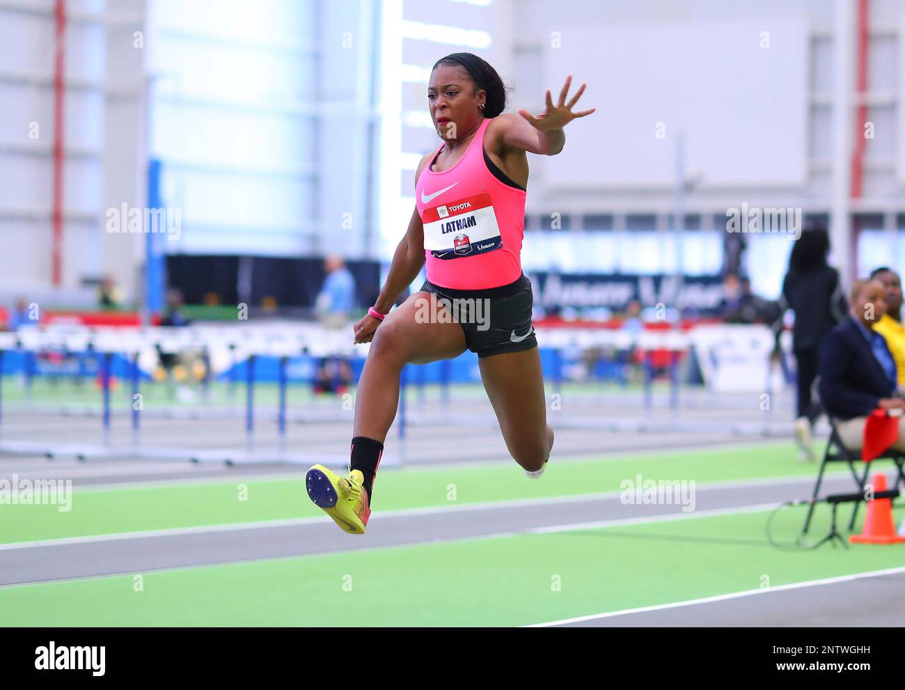 Viershanie Latham competes in the triple jump during the USA Indoor ...