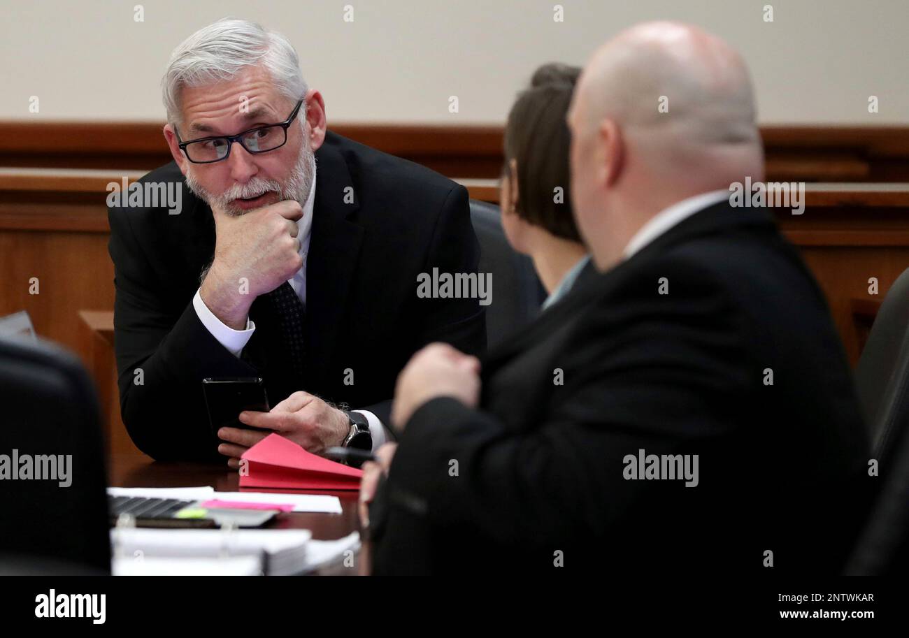 Defense attorney Robert Barfield talks with attorneys Katy-Marie Lyles ...