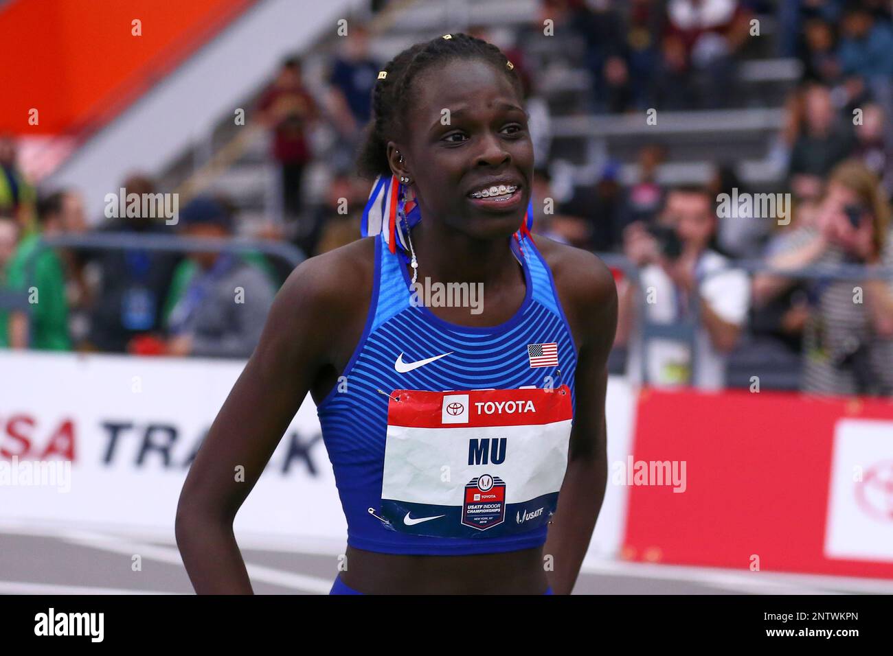Athing Mu celebrates after setting a new American Record time in the ...