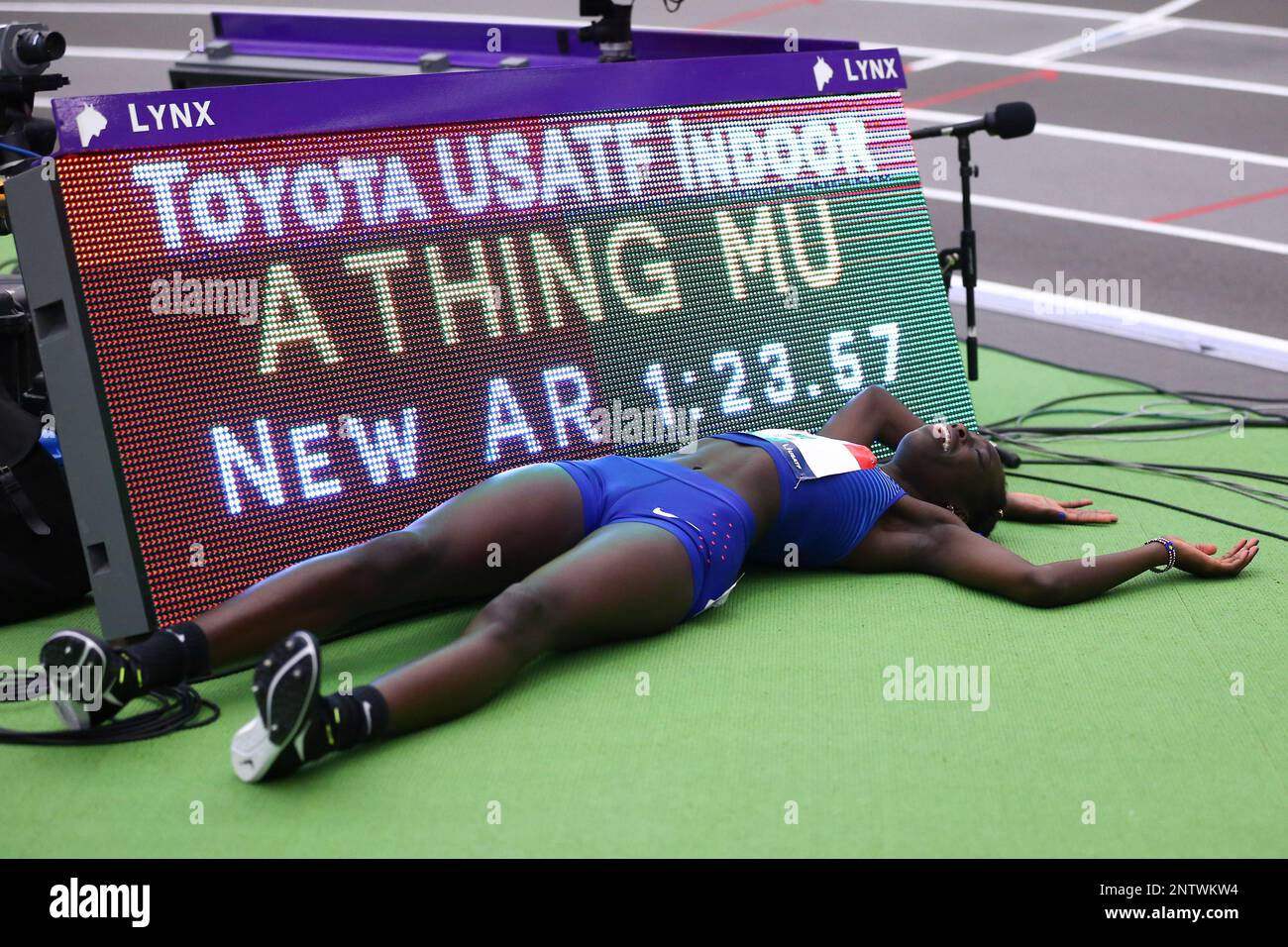 Athing Mu celebrates in front of her new American Record time in the ...