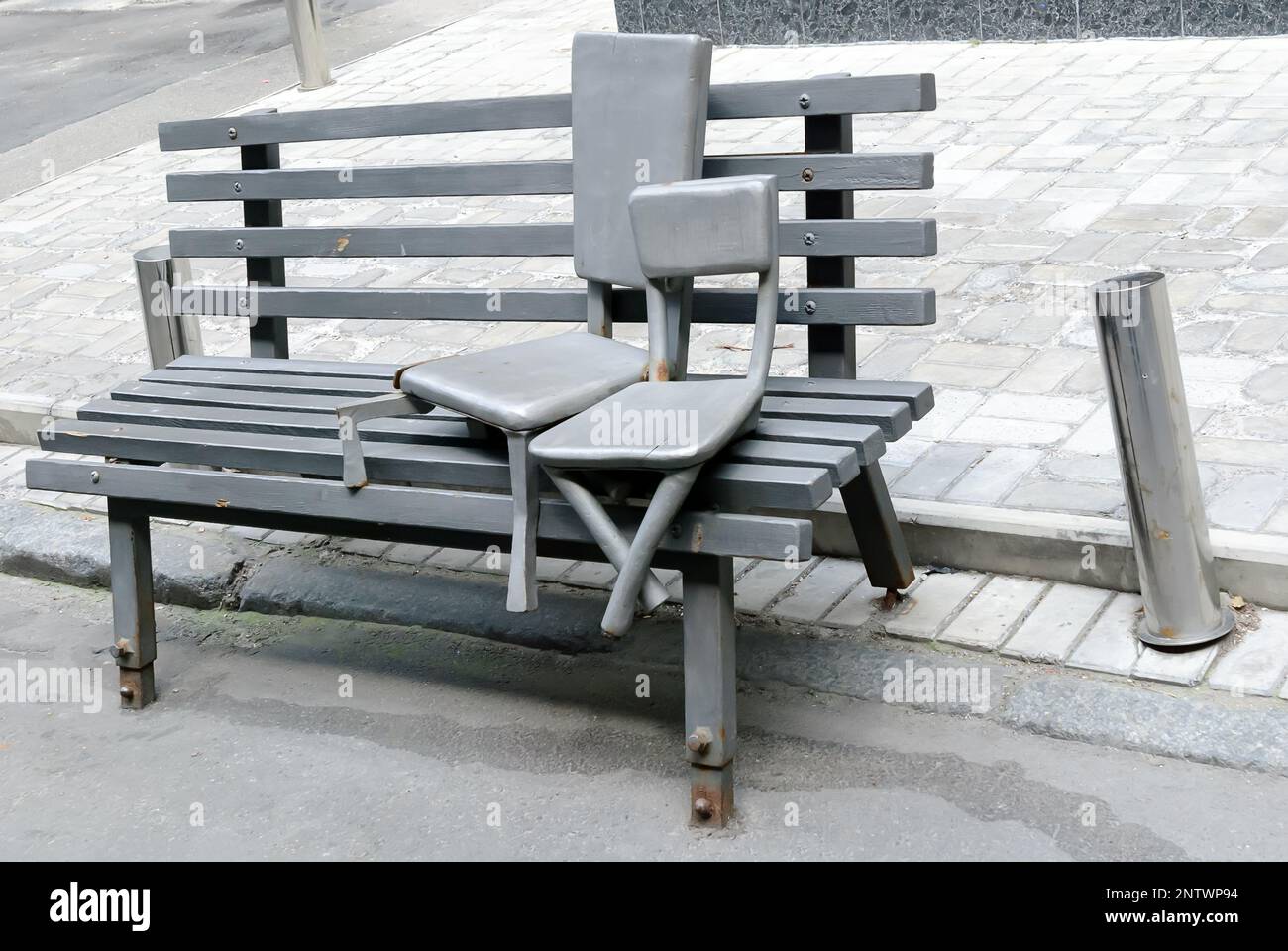 The sculpture Chairs on the bench is on Kiev Passage street right off ...