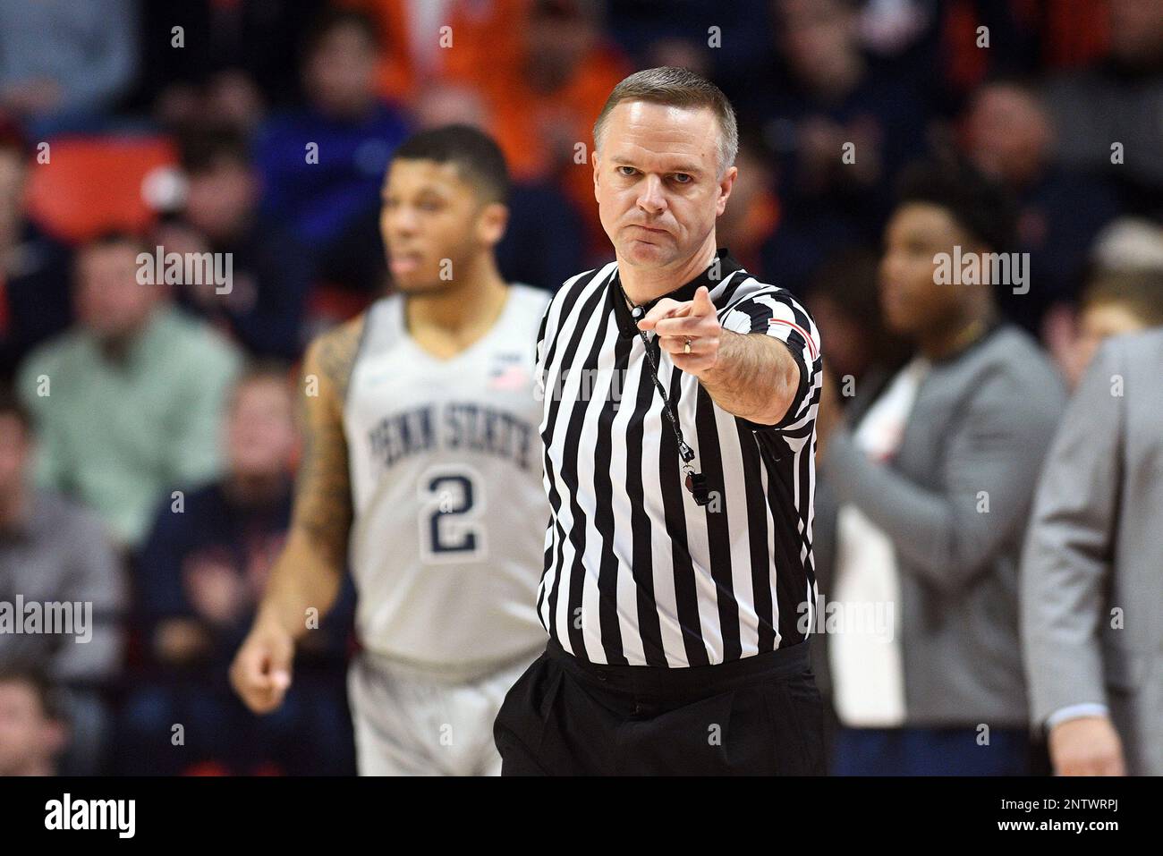 CHAMPAIGN, IL - FEBRUARY 23: Big Ten referee Paul Szelc makes a call ...