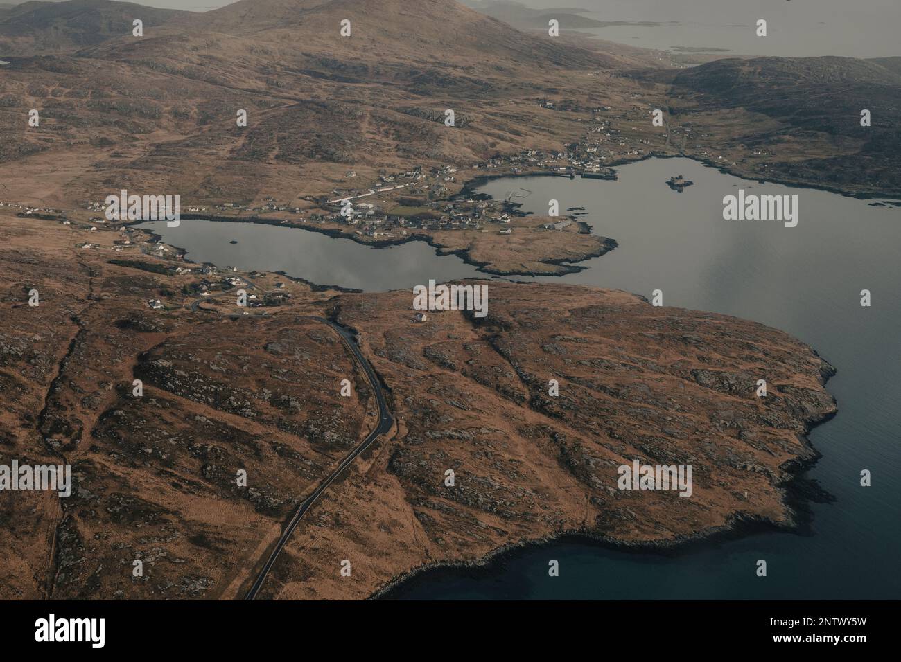 The shoreline of the Island of Barra in the Scottish Hebrides is seen ...