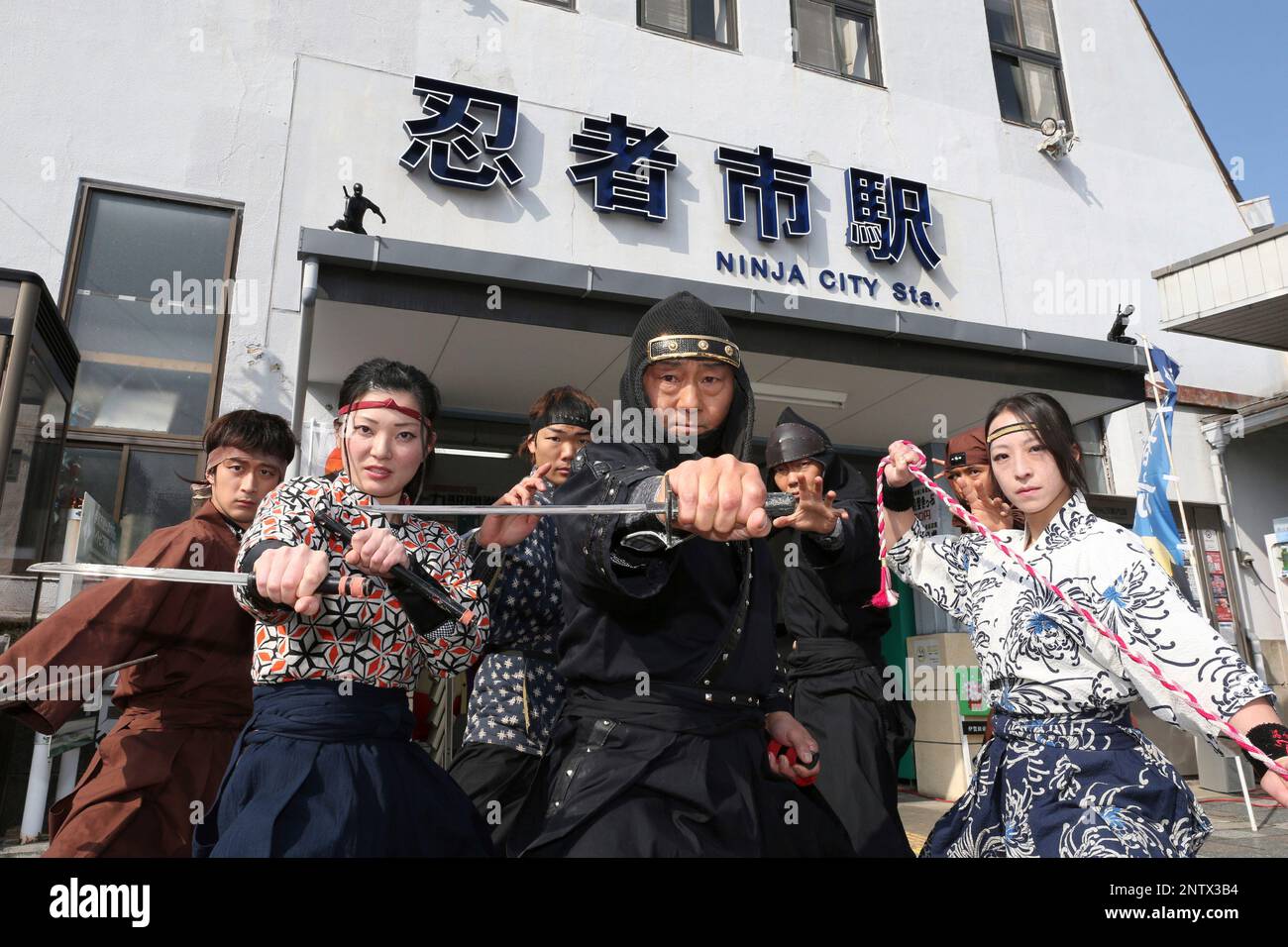 Sakae Okamoto (C), Iga city mayor, and other people clad as a Ninja ...