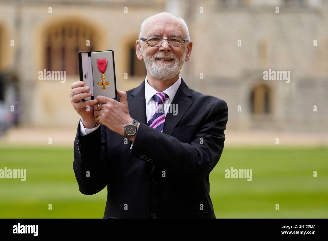 Martyn Butler, (David Hewett) after being made a Officer of the Order ...