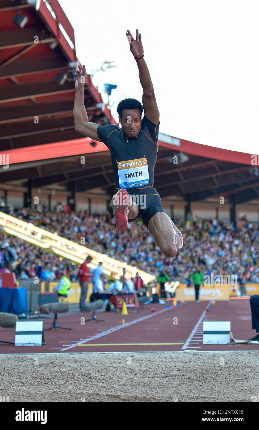Bermuda's Tyrone Smith leaps into the pit in the mens Long Jump during ...