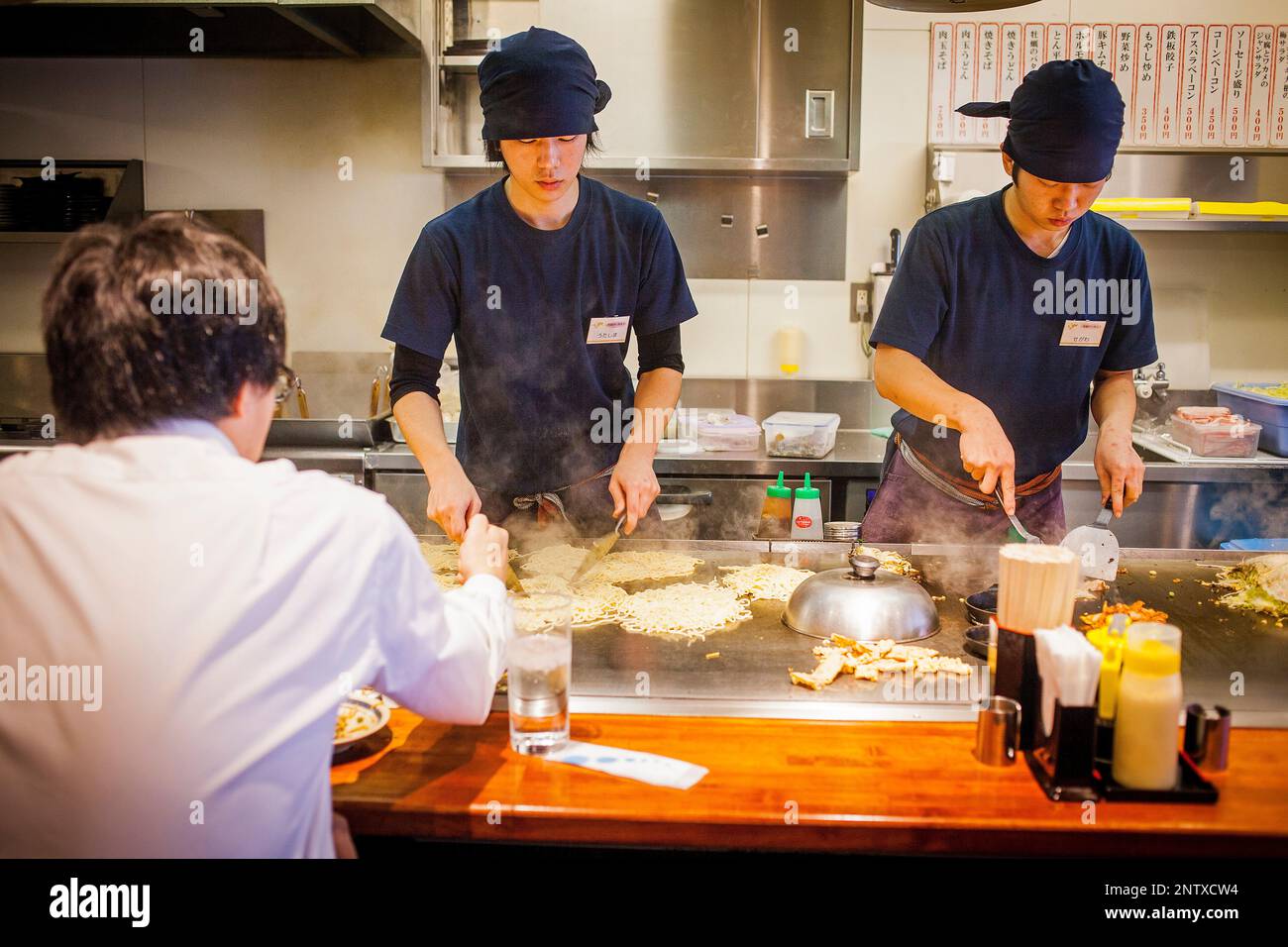 Chef Cooking In Front Of You