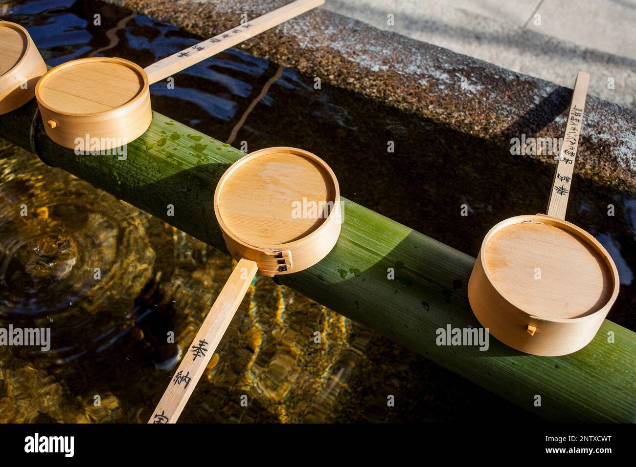 bamboo ladle used for cleaning hands before prayer, in Toshogu Shrine ...