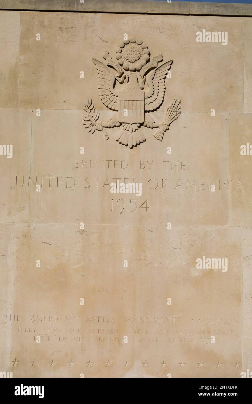 Detail stone carving of the opening of the Cambridge American Cemetery ...
