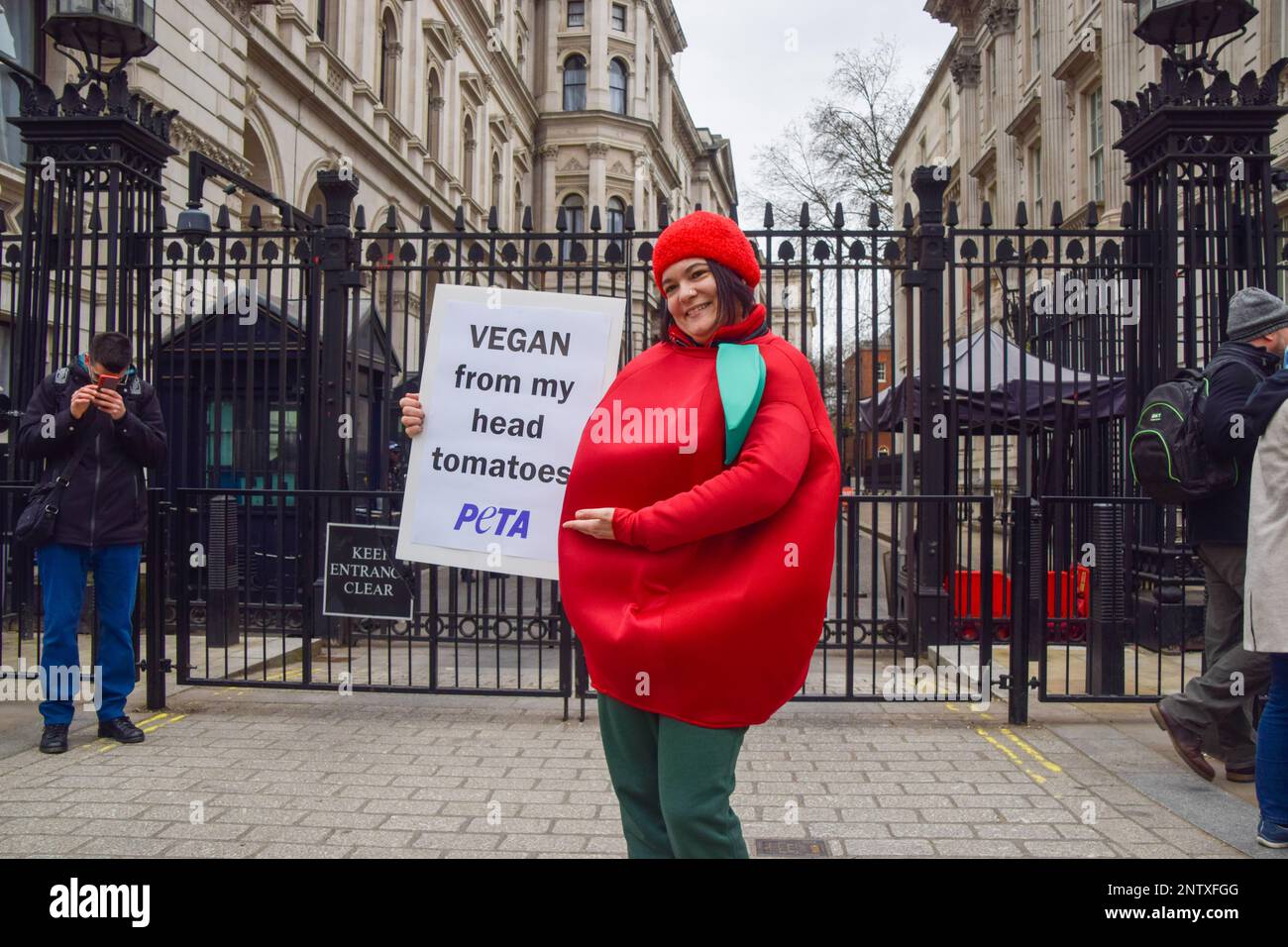 London, England, UK. 28th Feb, 2023. PETA activists dressed as a tomato ...
