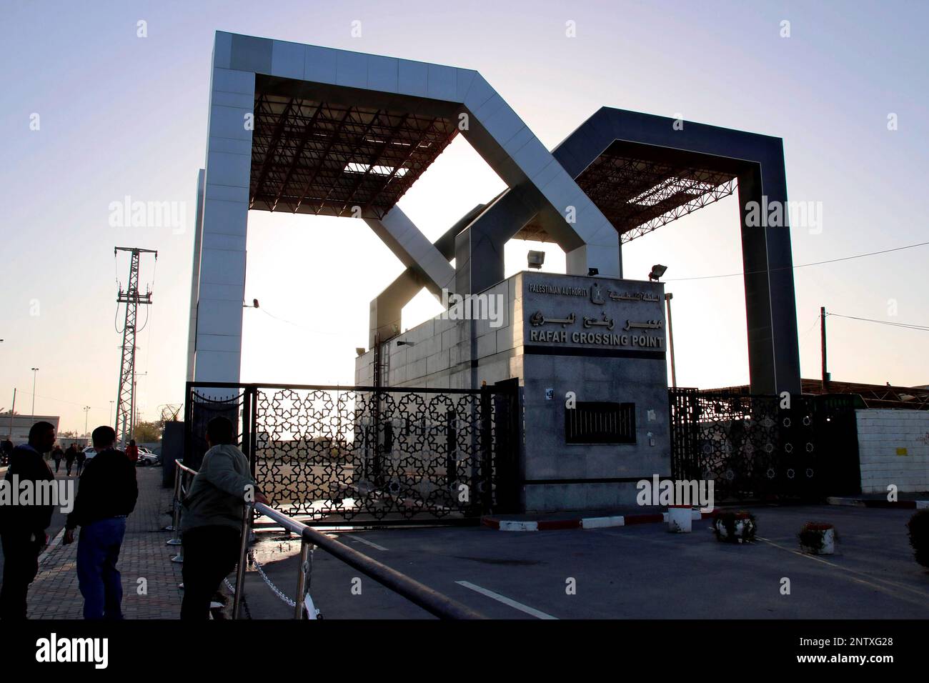 People gather at a checkpoint leading to Egypt in Rafah, Southern part ...