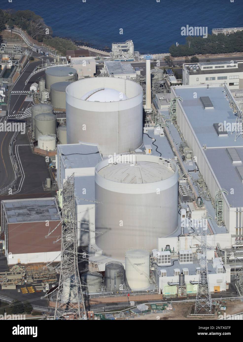 An aerial photo shows 1st reactor (rear) and 2nd reactor at Genkai ...