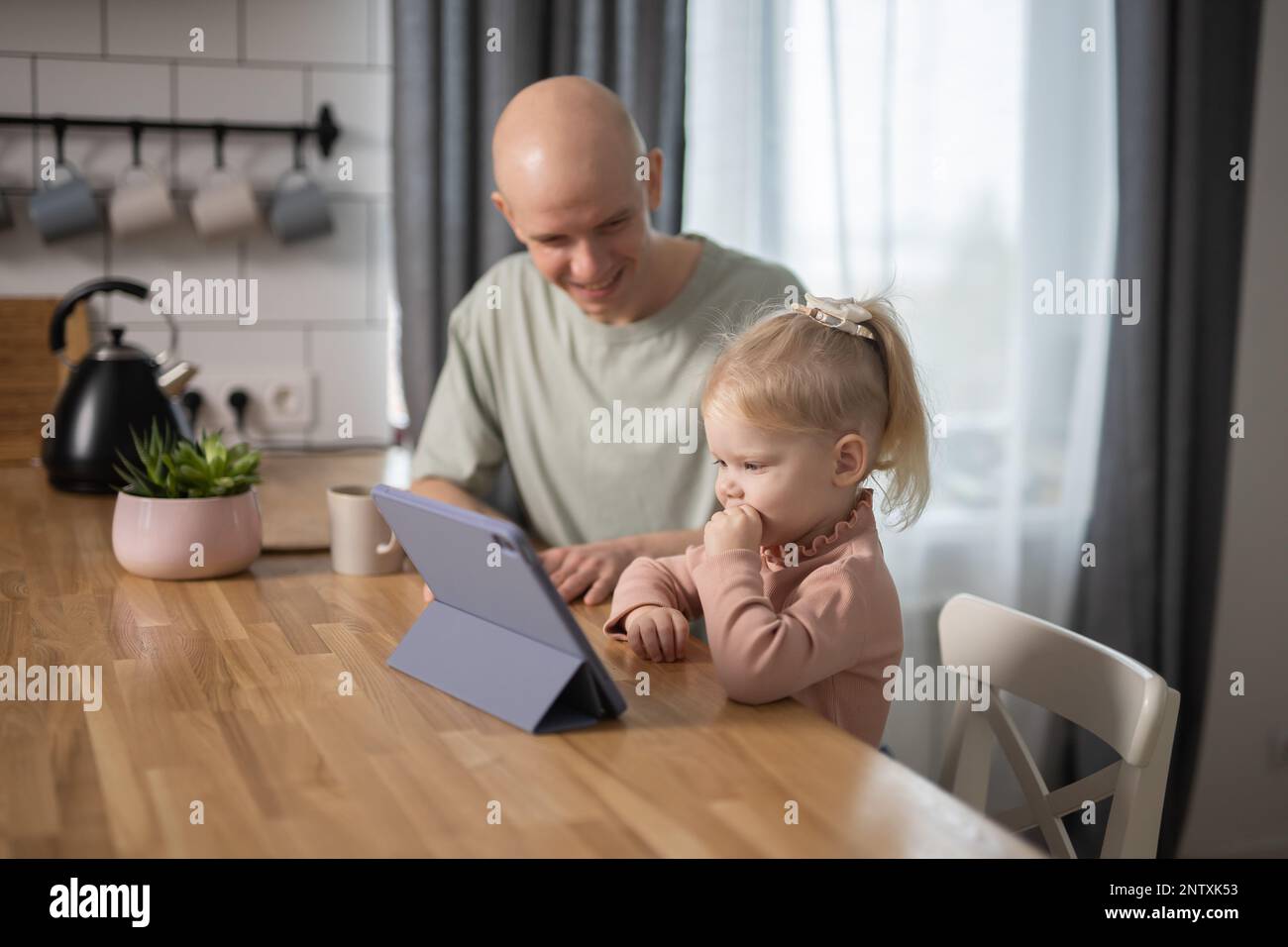 Cochlear implant system. Installation cochlear implant on child girl ...