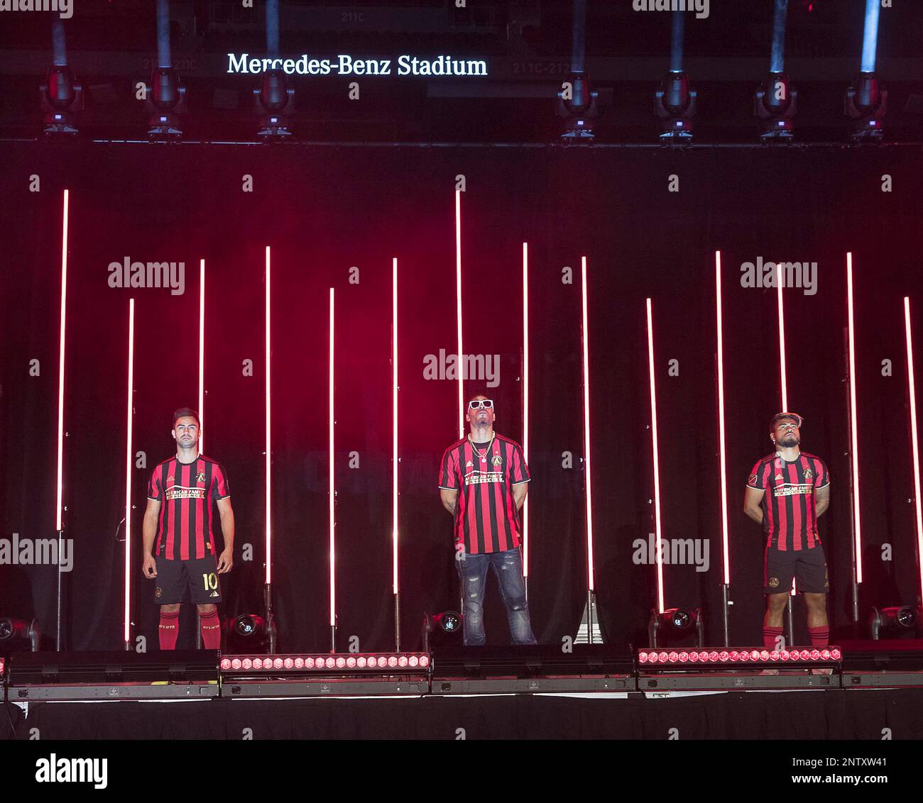 Atlanta United's Gonzalo Martinez, left, Atlanta rapper Fabo, center ...