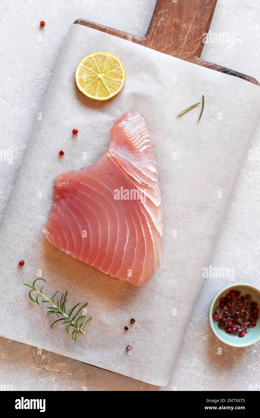 raw piece of tuna albacore fish, top view Stock Photo - Alamy