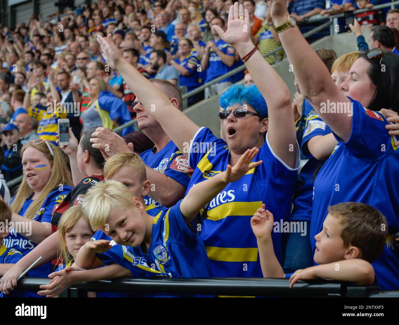 Warrington Wolves fans celebrate during the Ladbrokes Challenge Cup ...