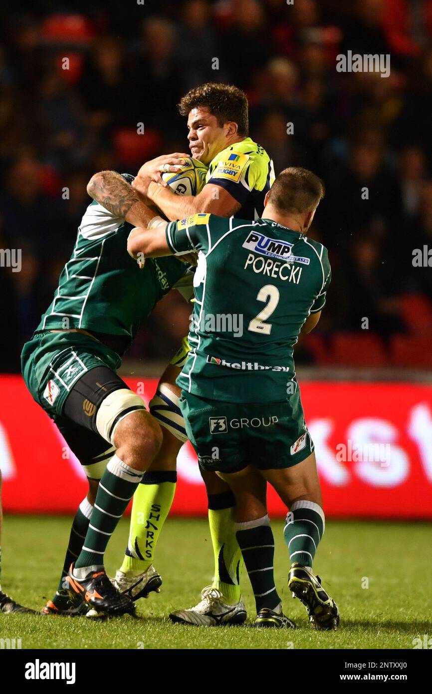 Sale Sharks flanker Jono Ross drives at the Irish defence during the ...